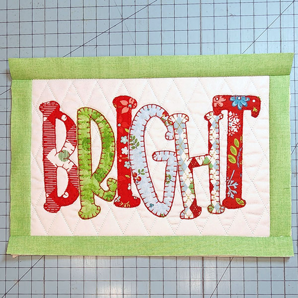 Merry and Bright Machine Embroidered Placemats - We Like Sewing